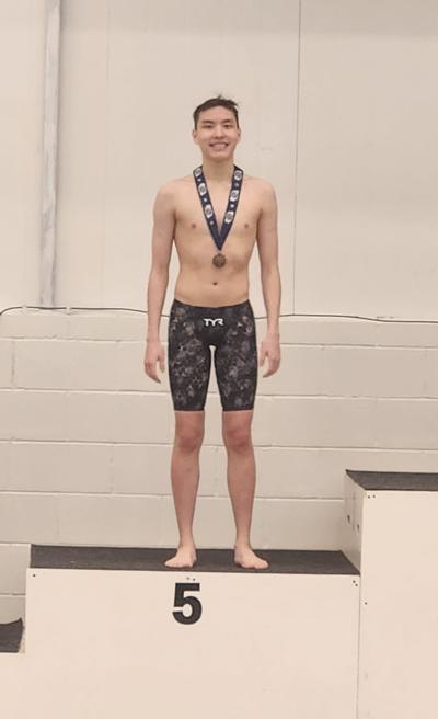 Scottsbluff/Gering's Mooc finishes 5th in 100 backstroke