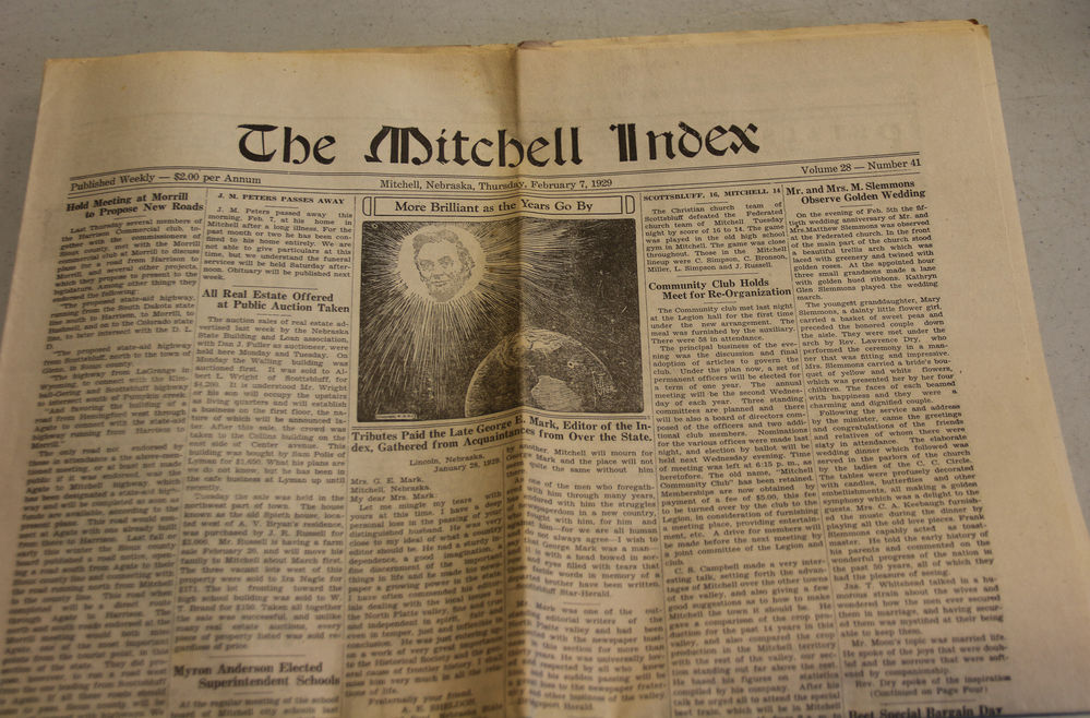LOOKING BACK: Mitchell gets a newspaper