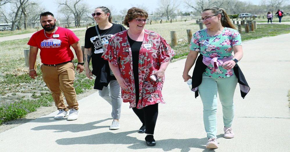 Local businesses take a stroll at lunch to celebrate National Walk at ...