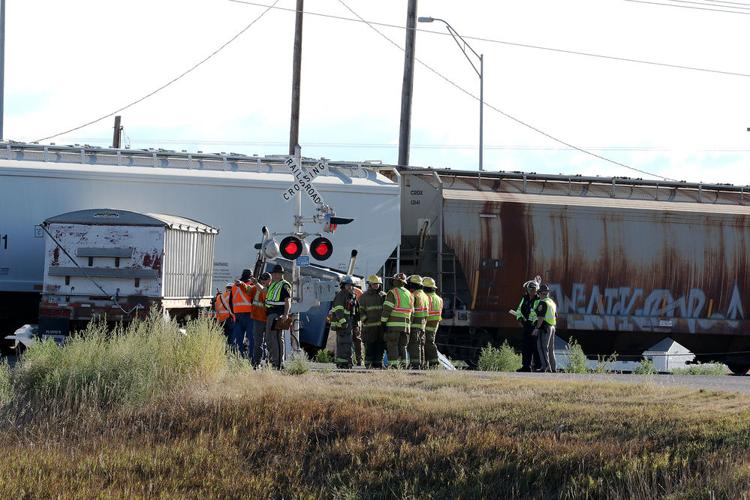 Driver escapes injury, semi totaled in collision with train