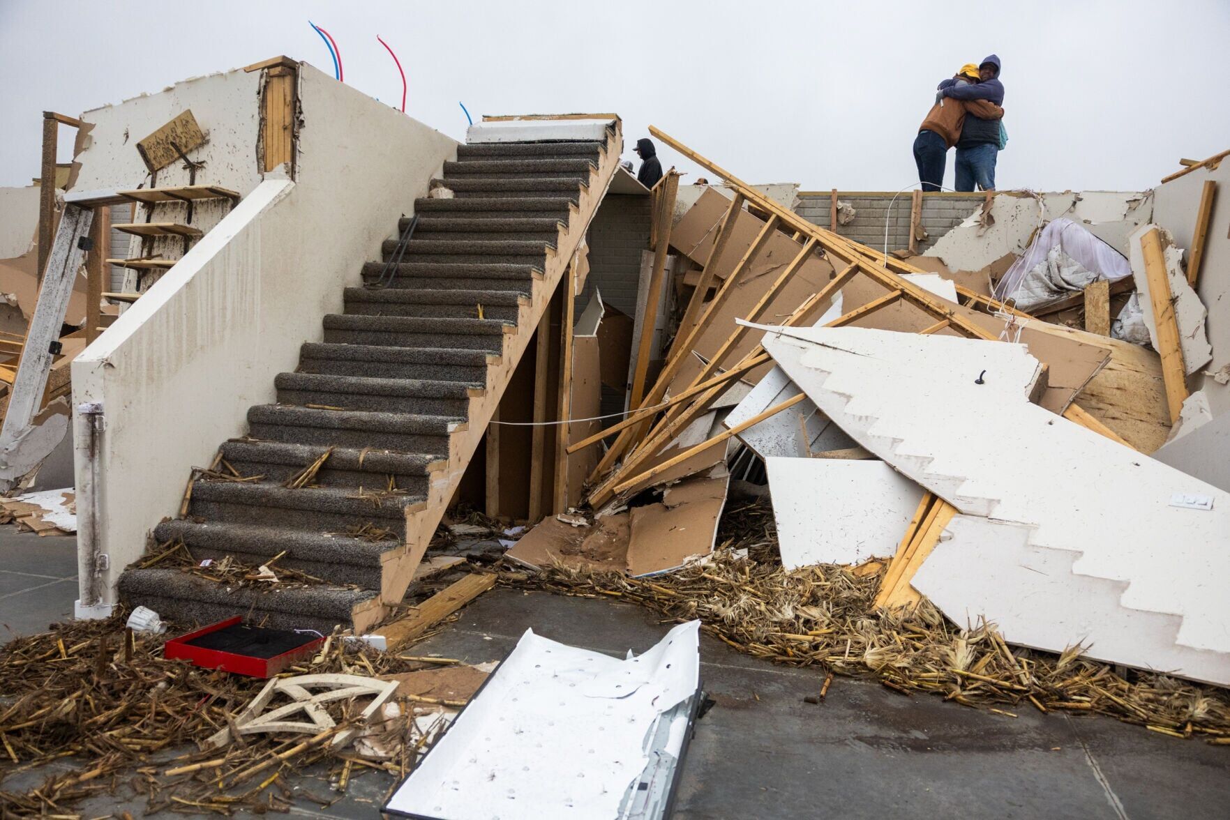 Photos and video: Nebraskans pick up the pieces day after Howard County ...