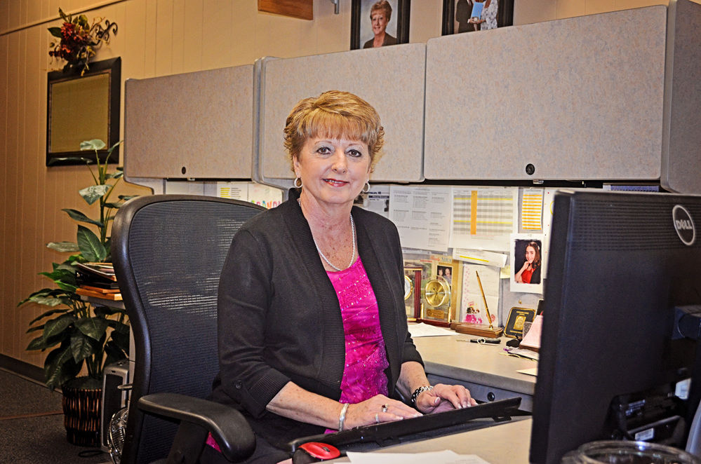 Kathy Behling's first boss hesitated to hire her; She'll have been with ...