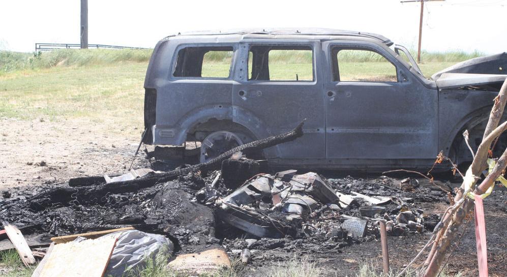 Man burned, car totaled in Lyman fire