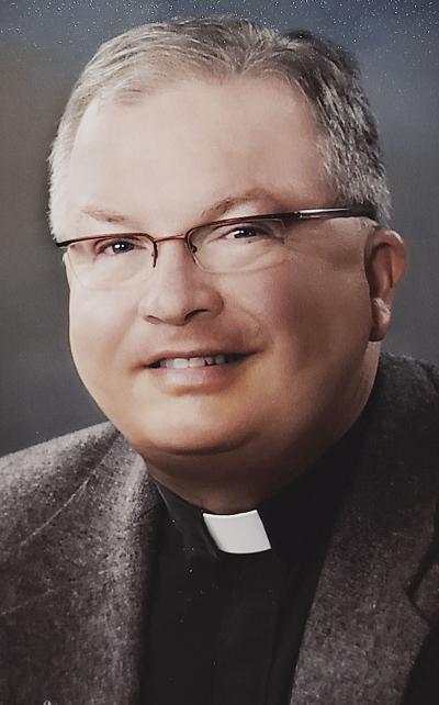 Father Mike McDonald serves as pastor of Christ the King Catholic Church