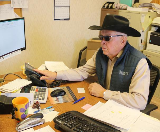Burford credits long-time employees for success