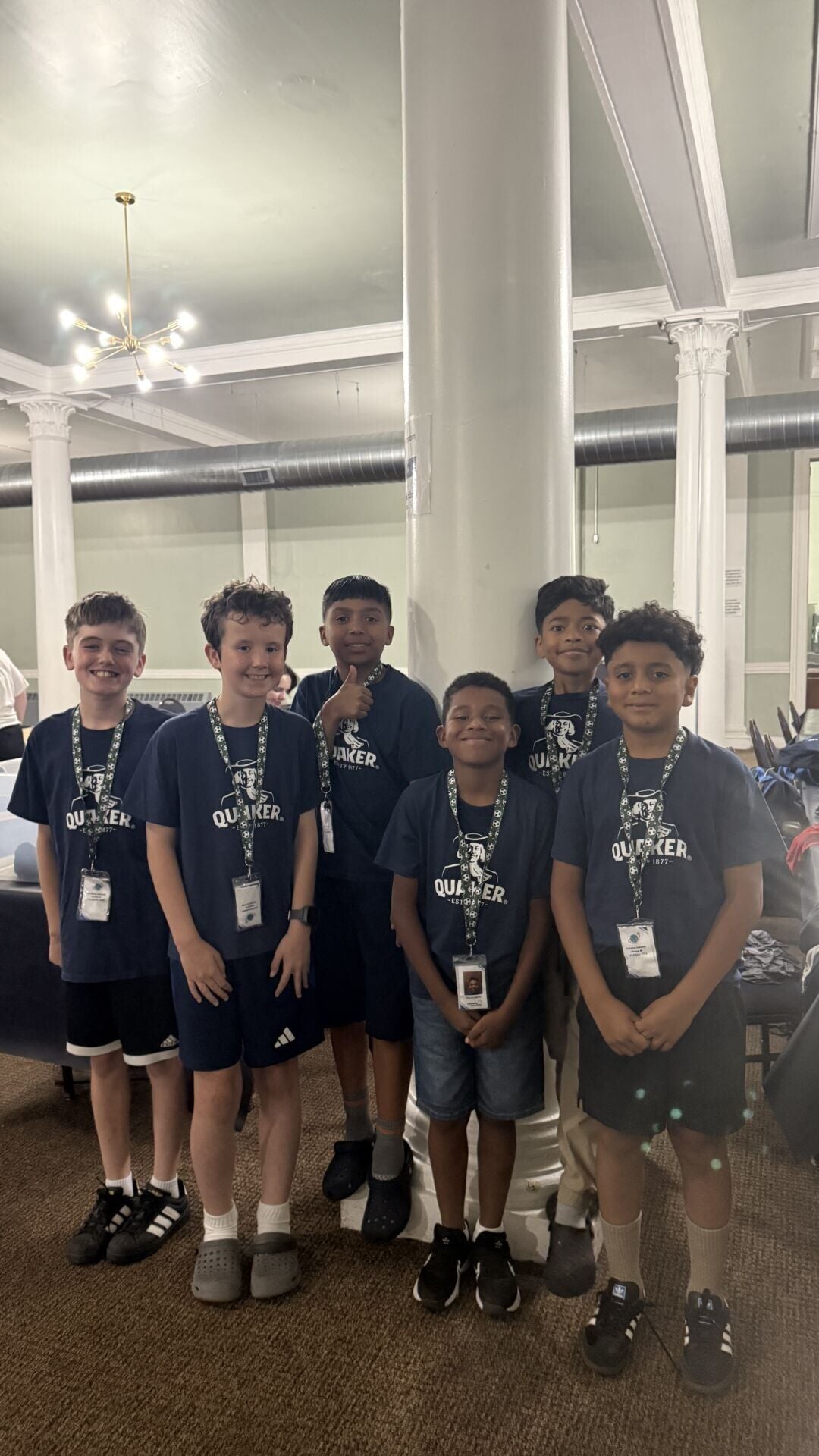 Omaha students walk with players at Kansas City World Cup game