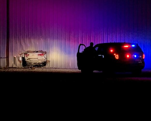 Woman cited on charges after driving car through building