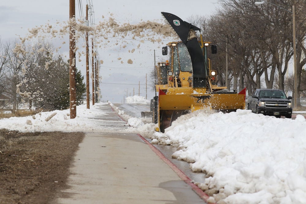 Road crews nearly done with clearing routes due to snow storm, clean up ...