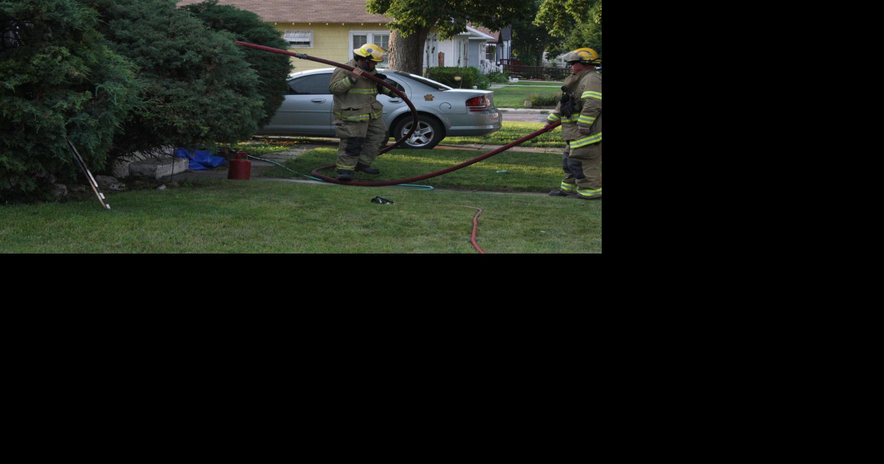 Gering fire started by fireworks; neighbors help put out fire