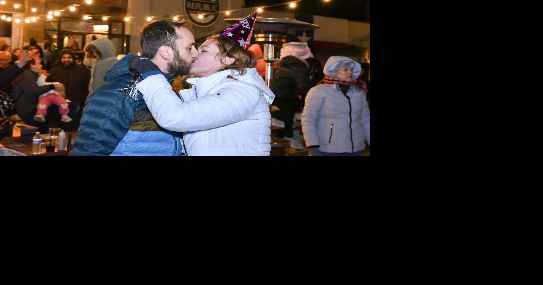 Digital ball drop, confetti cannon blast mark countdown to midnight in ...