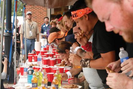 Hundreds brave weather to watch annual tamale eating contest | News ...