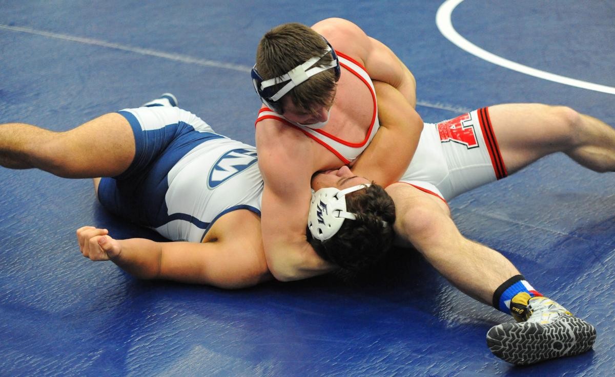 Wrestling: Allen cleans up at regionals, sends 15 to state; other ...