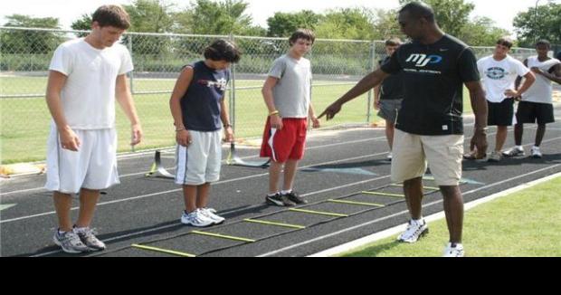 (SLIDESHOW) Michael Johnson trains young athletes at local middle ...