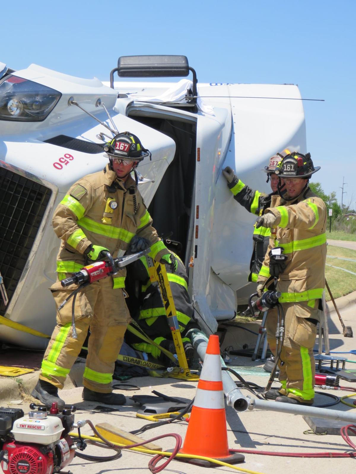 Lewisville firefighters rescue trapped truck driver | News ...