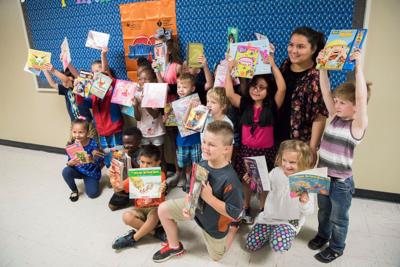 A Beasley Elementary student collects over 500 books | Homepage ...