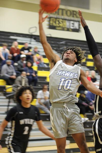 Hebron boys basketball team retooling for another run at regional ...