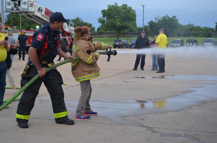Lewisville CFA grads try their hand at firefighting skills | Lewisville ...