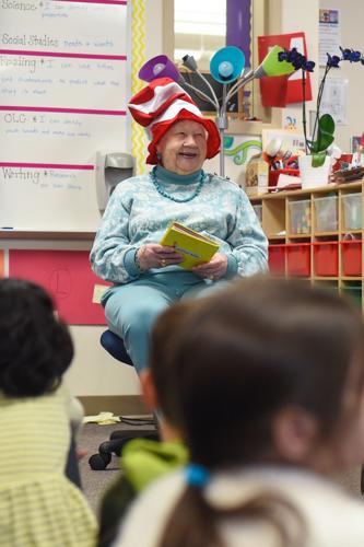 Happy birthday, Dr. Seuss: Volunteers in hats read at Tadlock ...