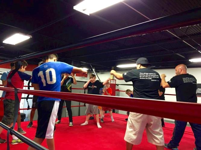 Creating strong bonds: Boxing club mentors children, teens | News ...