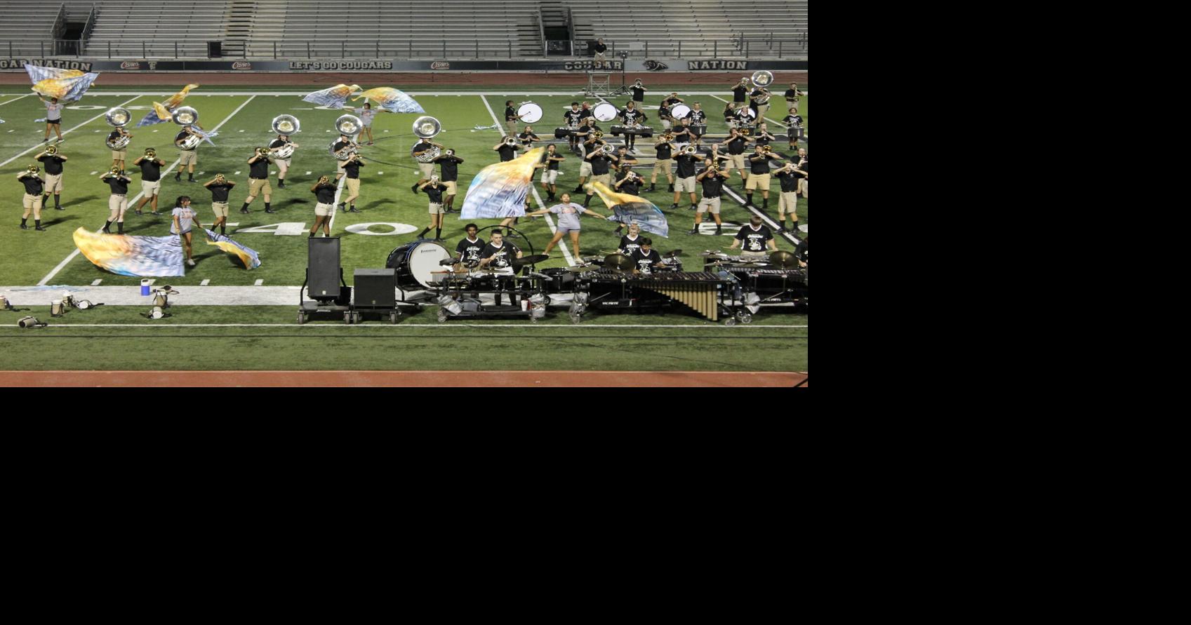 Strike up the band! The Colony High School band students give fans a ...