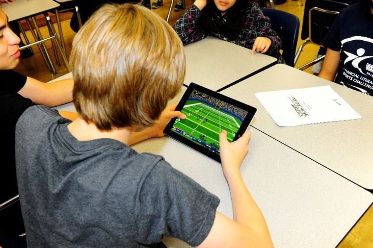 Bowman Middle School students become pros in 'Financial Football ...