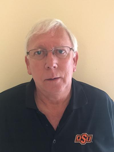 Terry Gilman talks about roles with city, large book collection | News ...