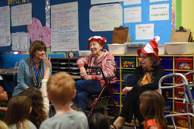 Happy birthday, Dr. Seuss: Volunteers in hats read at Tadlock ...