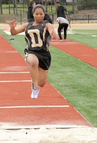 Lady Trojans win George Hancock title, boys place second in opening ...