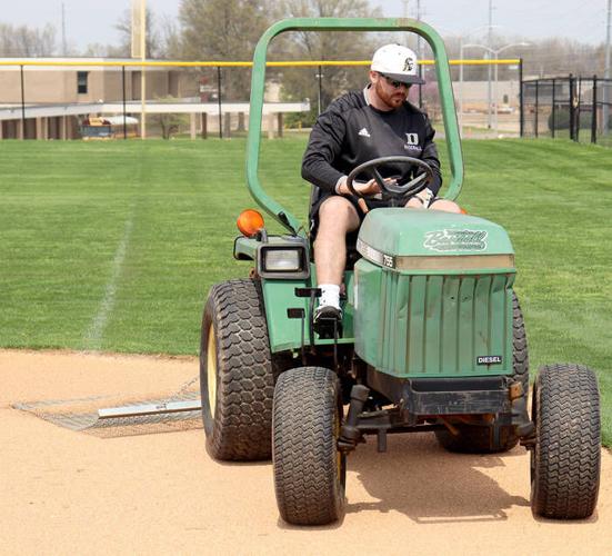 Tending to the baseball field is a Mathis family tradition for two ...