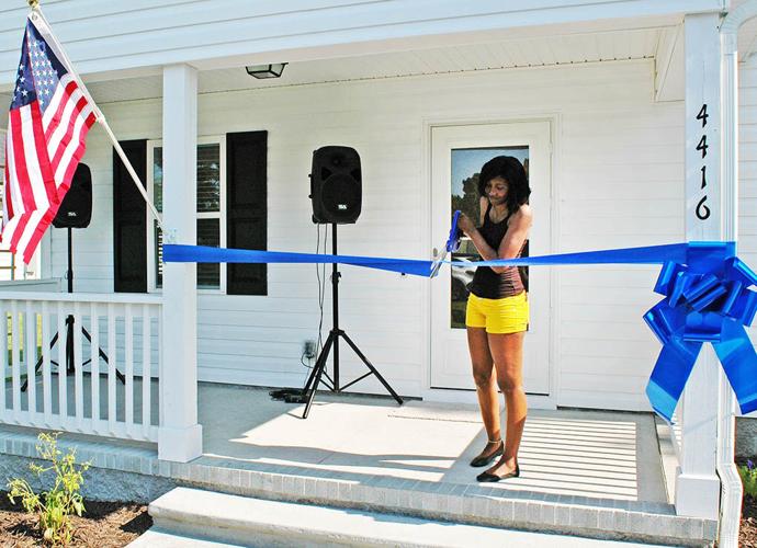 Long wait over for newest Habitat for Humanity homeowner | Community ...