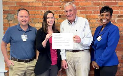 Physicians, Dosher donate to New Hope Clinic | Community Focus ...