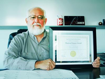 Oak Island's Kelly honored with 'Impact Award' | News | stateportpilot.com