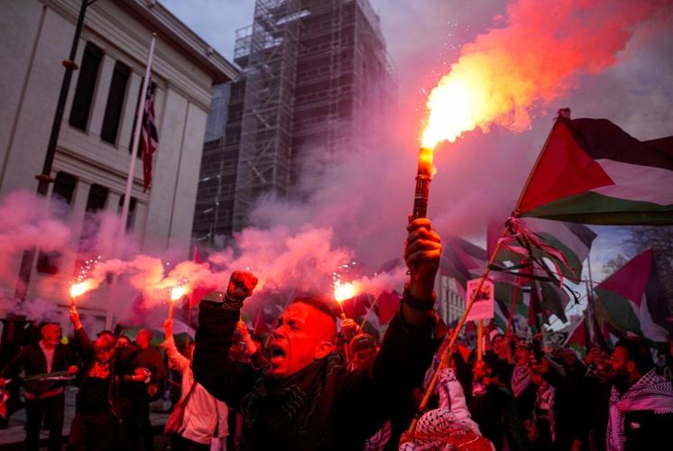 Pro-Palestinian protesters march to stadium before Norway's 5-0 World ...