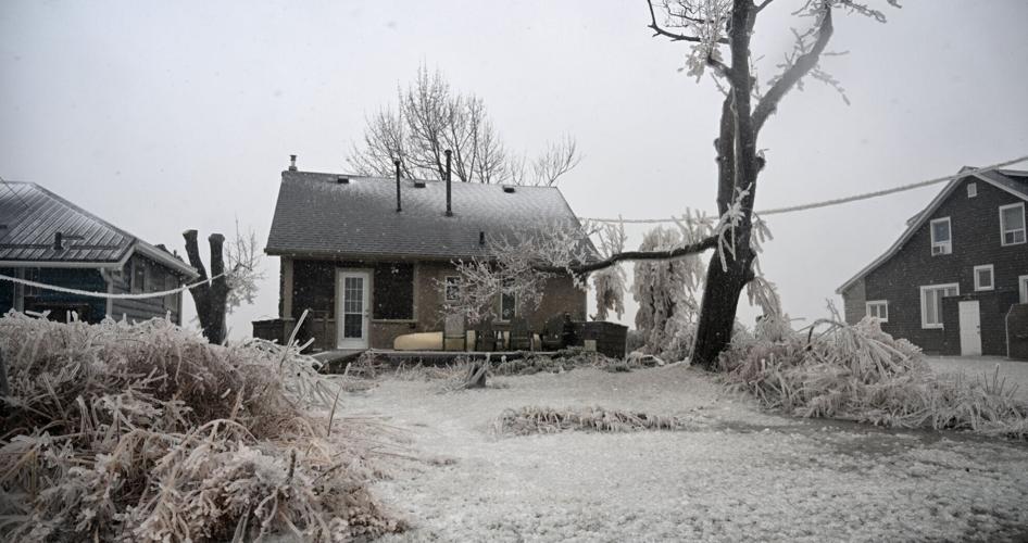 Lake Erie shoreline caked in ice as winds whip up waves