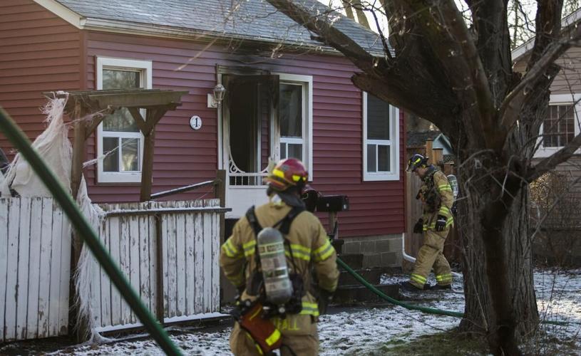 Firefighters pull woman from burning home in St. Catharines