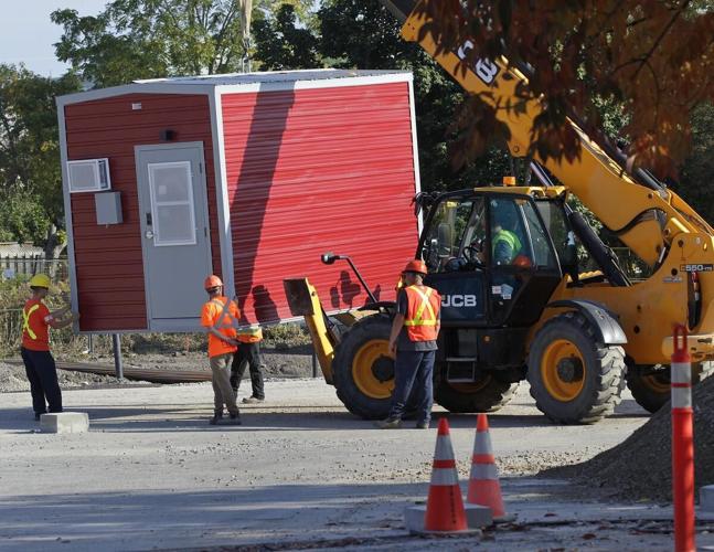 City expects people to move into modular cabins this month