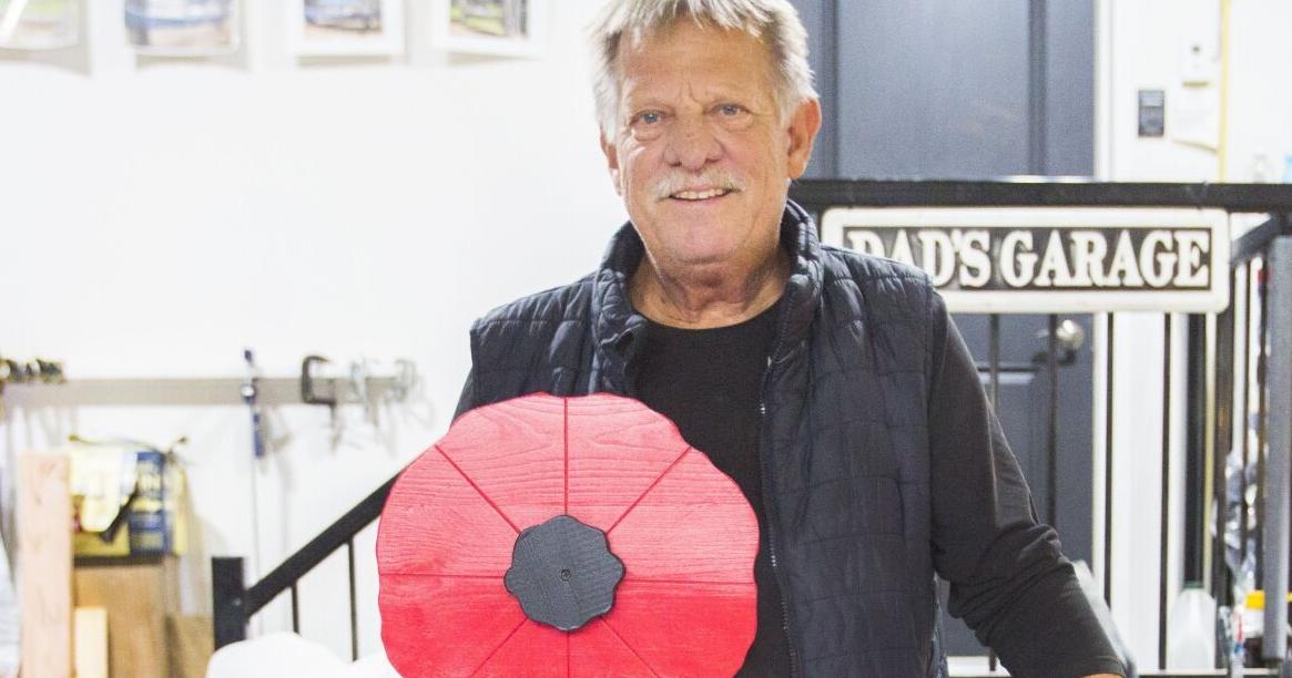 Wood craftsmen make poppies in honour of Remembrance Day
