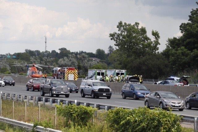 Air ambulance lands on QEW in response to crash