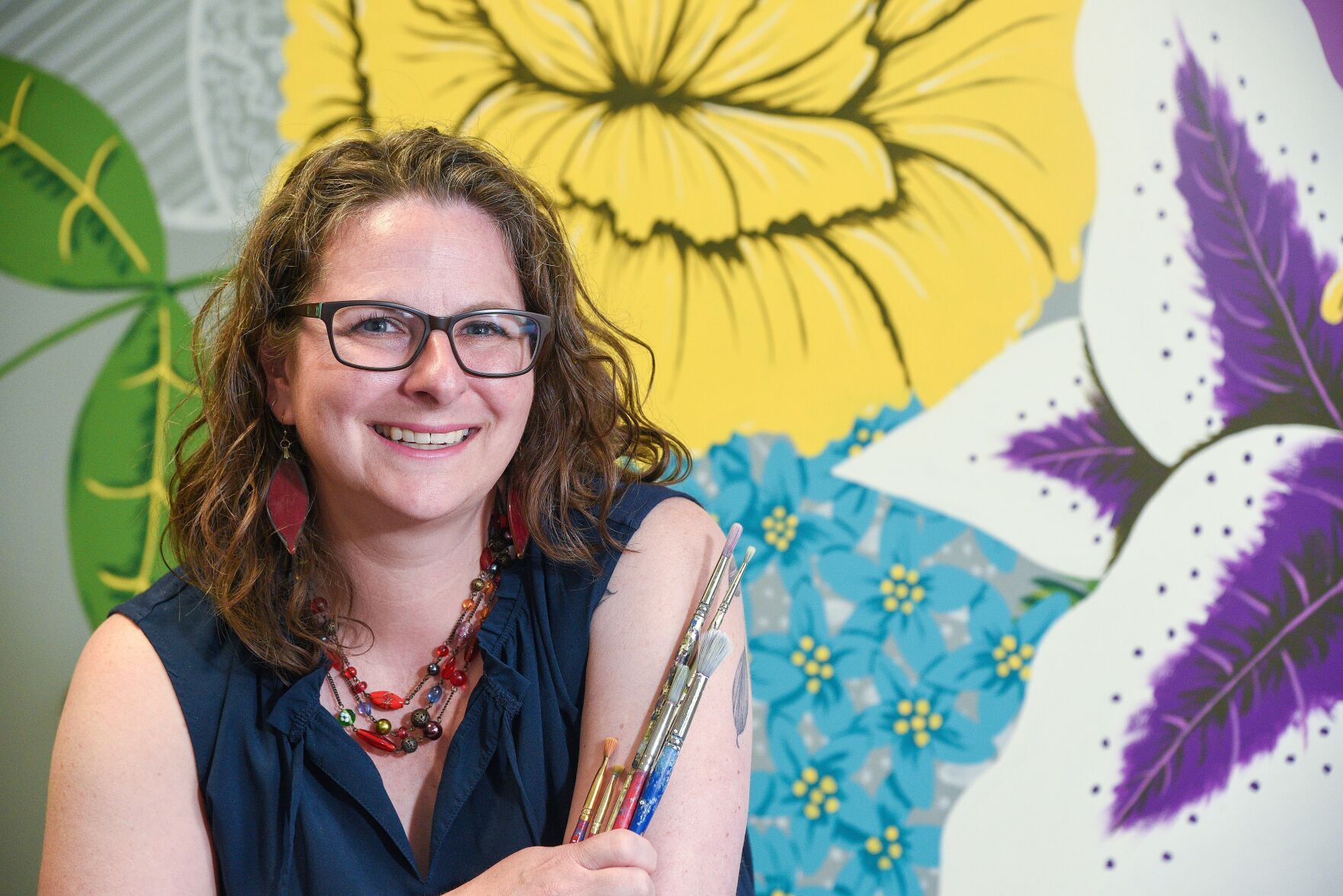 Brushing away grief: Mural brings colour, comfort to hospice