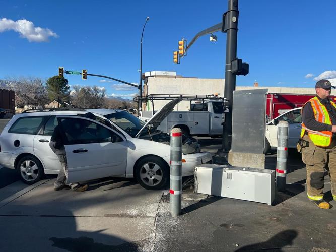 Police: Driver runs red light, causes collision that knocks out traffic ...