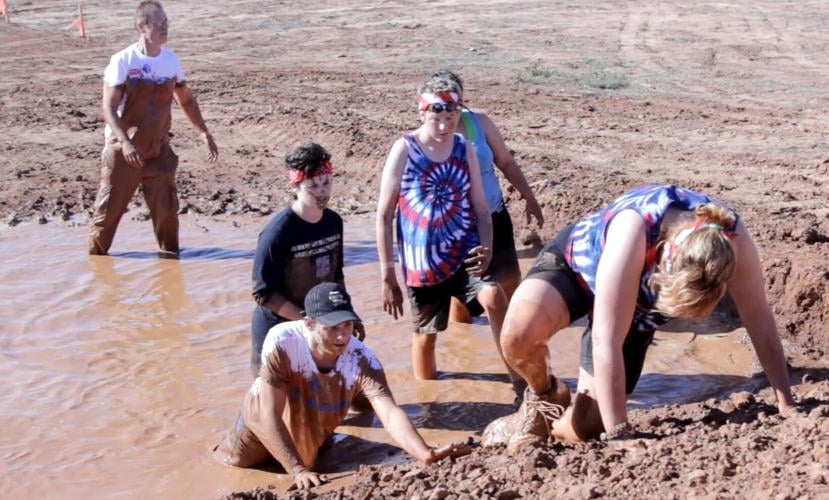Hurricane Mud Run: 100s hit wet wet dirt, come out smiling; STGnews ...