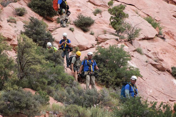 Trapped climber sleeps at edge of 600-foot cliff overnight | Local News ...