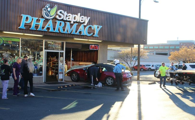 Mustang crashes into Stapley Pharmacy within feet of 3 employees ...