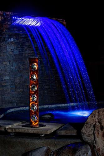 Good chimes: This artist crafts sculptures featuring ringable bells and ...