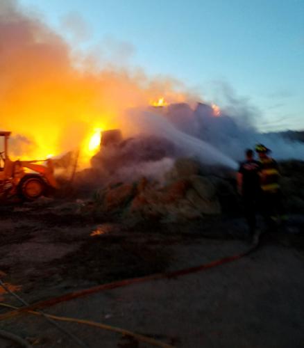 Multiple departments battle 300-ton haystack fire at Bundy Ranch in ...