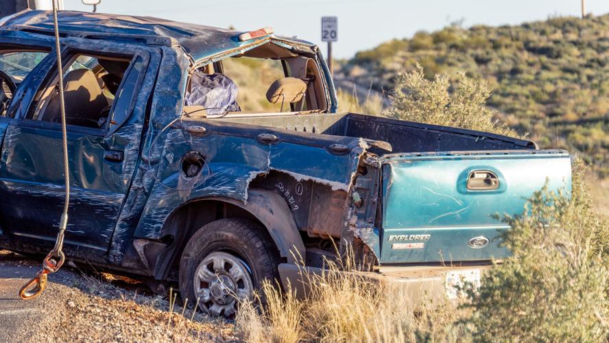 Man rolls truck towing oversized load, crashes through fence near Dixie ...