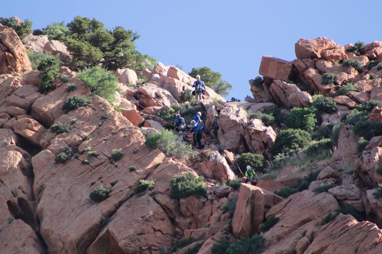 Trapped climber sleeps at edge of 600-foot cliff overnight | Local News ...