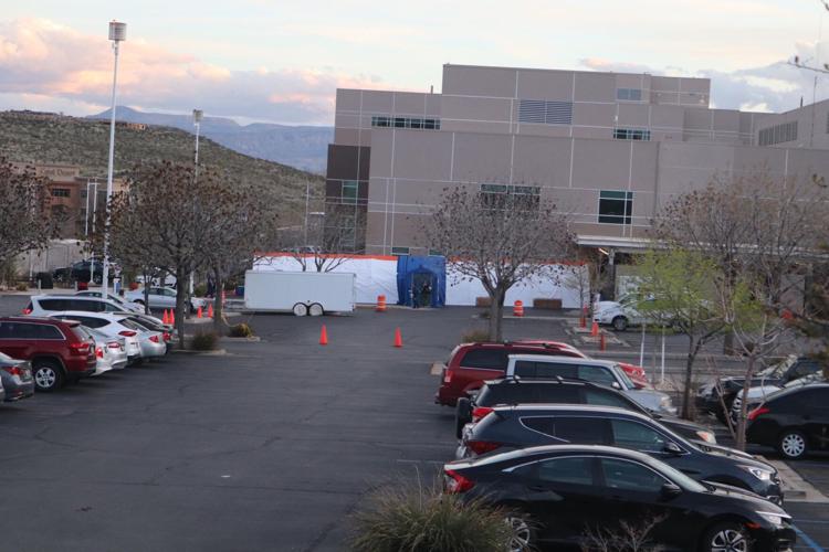 Local agencies chip in to help set up tents for additional ER space at ...