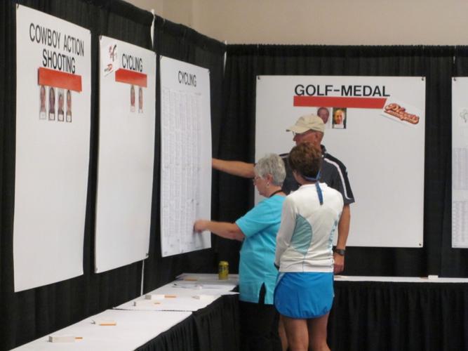 Dixie Center abuzz setting up Senior Games Headquarters | Life ...