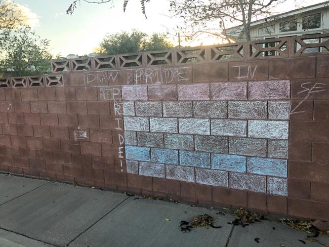 Graffiti or freedom of speech? SUU students wash off chalk from wall ...